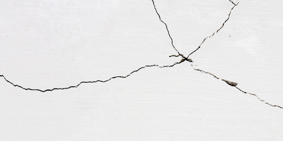 What causes Drywall seams cracking?